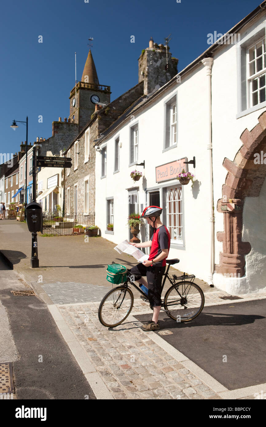 The town centre Whithorn cyclist looking at map at the Pend leading up ...
