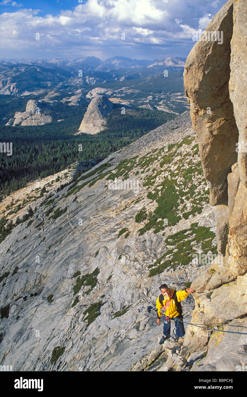 Climber on the regular route on Eichorn Pinnacle Tuolumne Meadows area ...