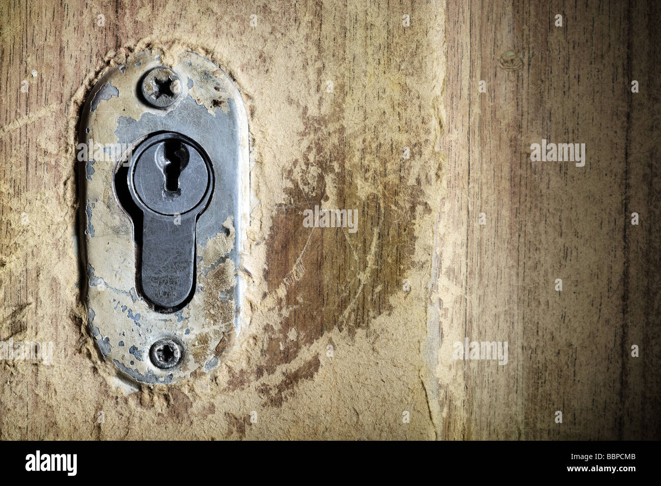 Close up photo of the old keyhole on the olden door Stock Photo - Alamy