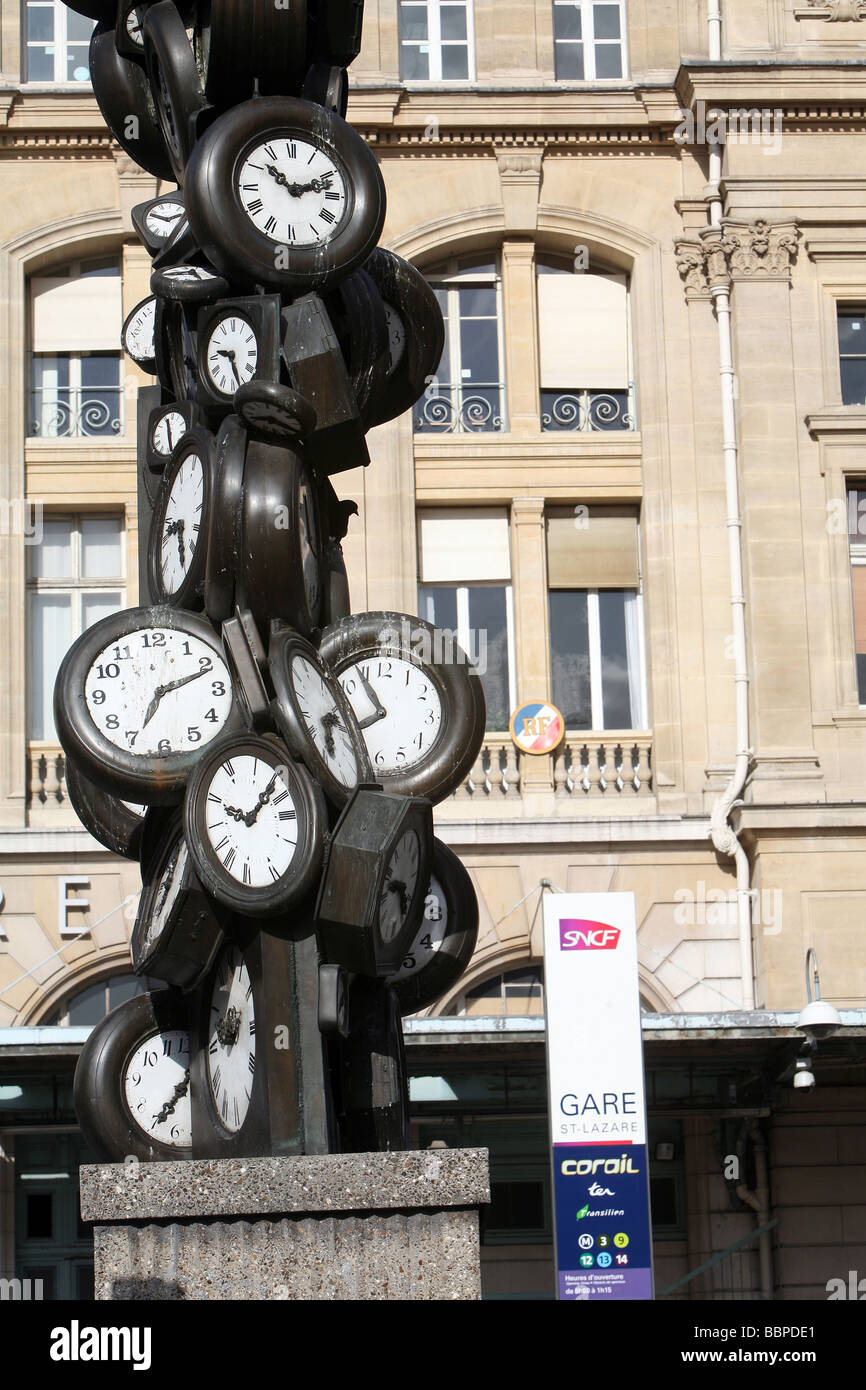 FACADE OF THE GARE SAINT LAZARE TRAIN STATION AND SCULPTURE 'THE CLOCKS ...