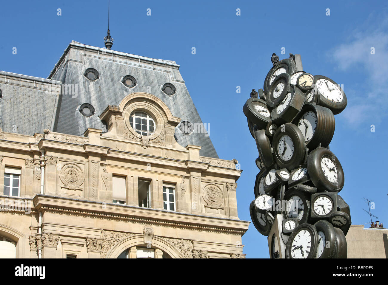 FACADE OF THE GARE SAINT LAZARE TRAIN STATION AND SCULPTURE 'THE CLOCKS ...