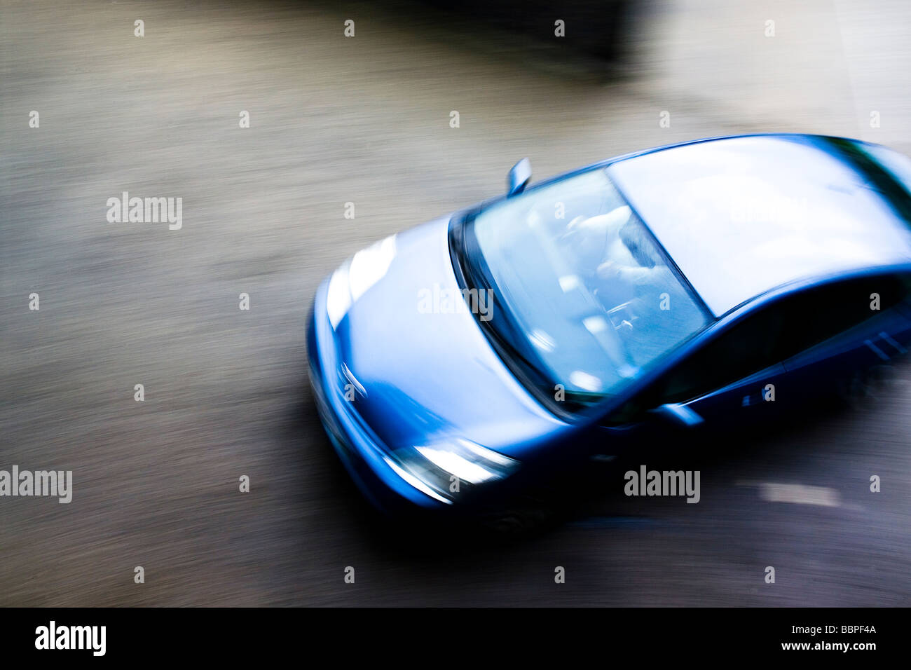 Blurred blue car from above Stock Photo - Alamy