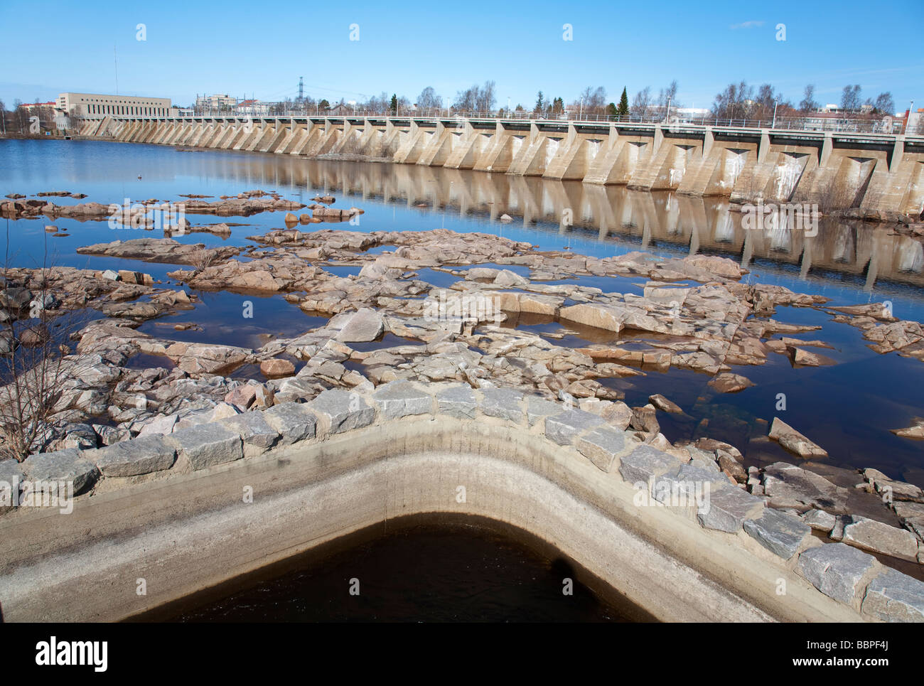 Low water exposes riverbed behind Merikoski hydroelectric power plant ...