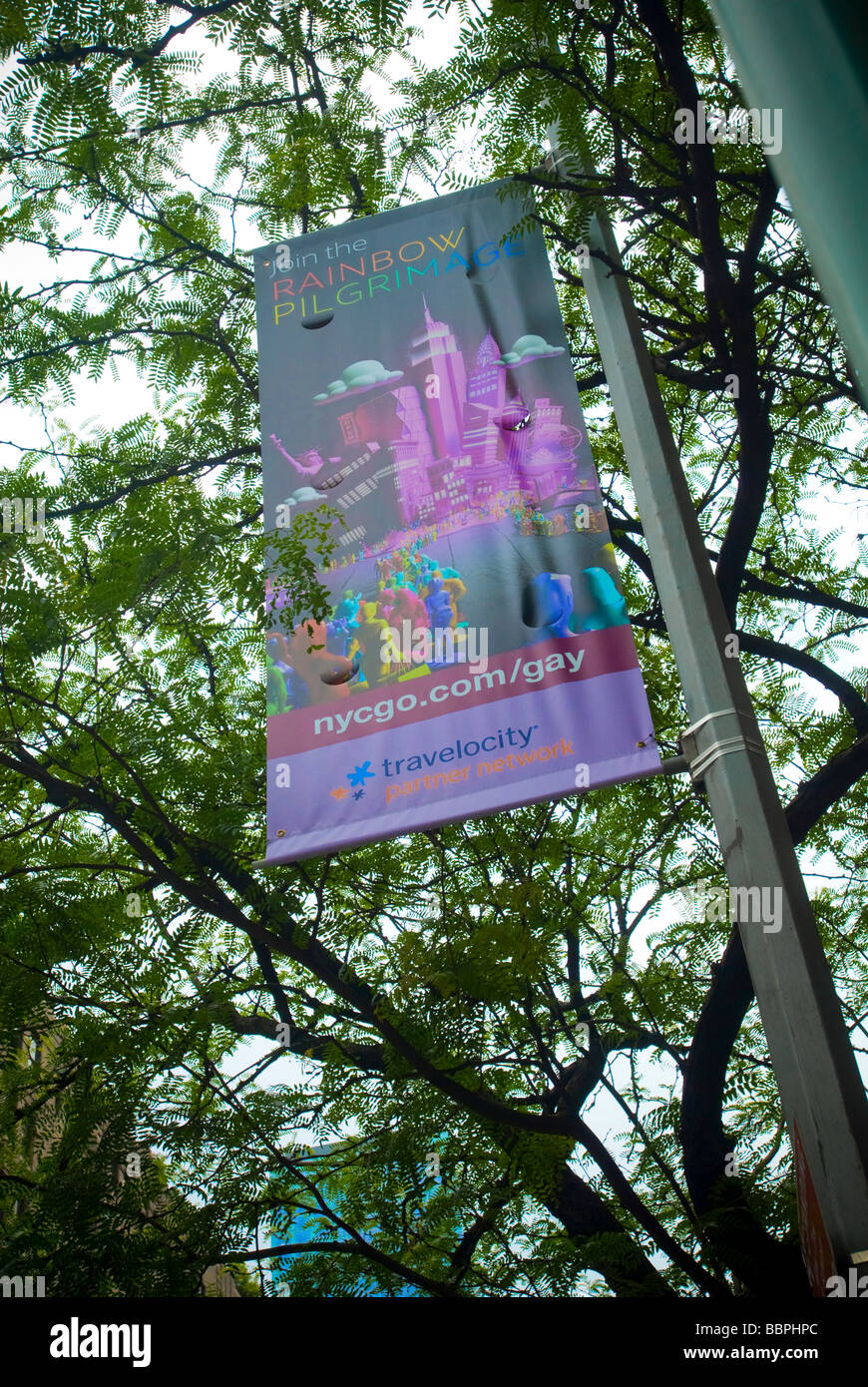 A banner promoting the Rainbow Pilgrimage is seen on a lamp post in New ...