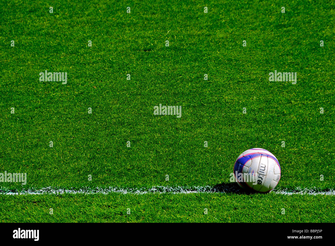 Football on a white line Stock Photo - Alamy
