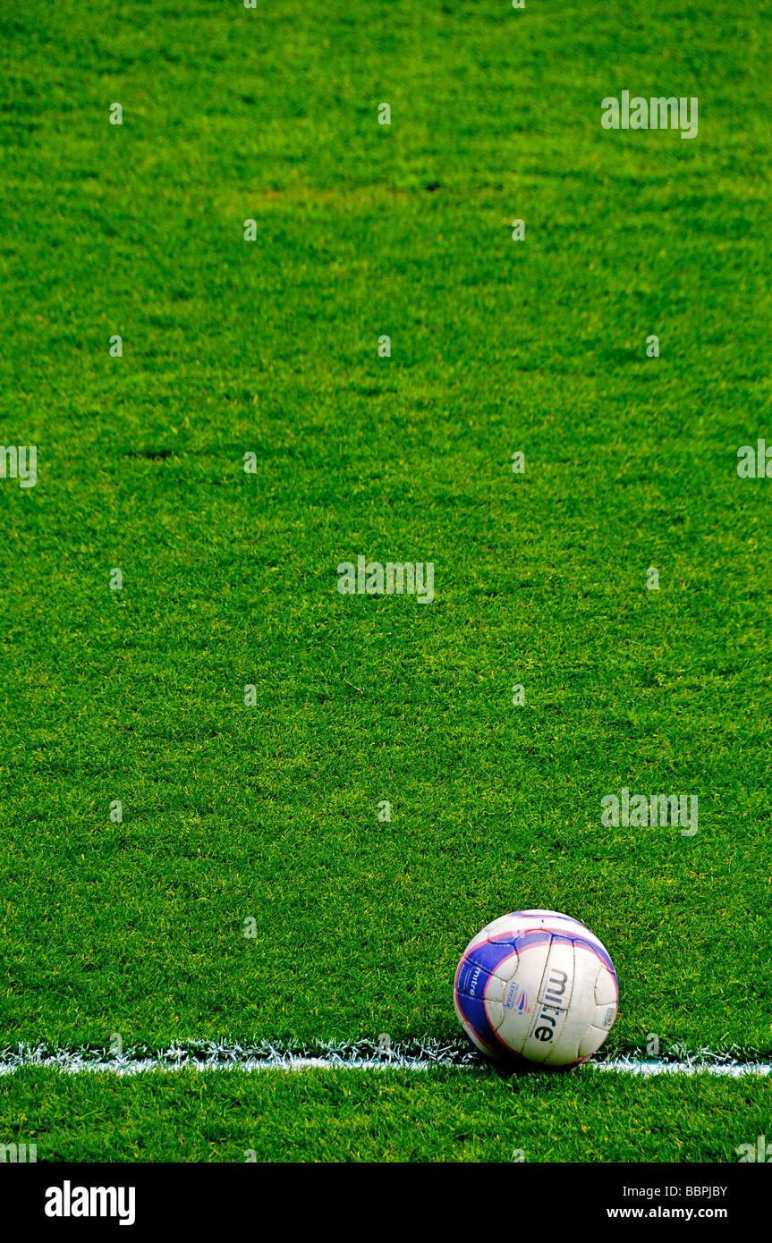 Football on a white line Stock Photo - Alamy