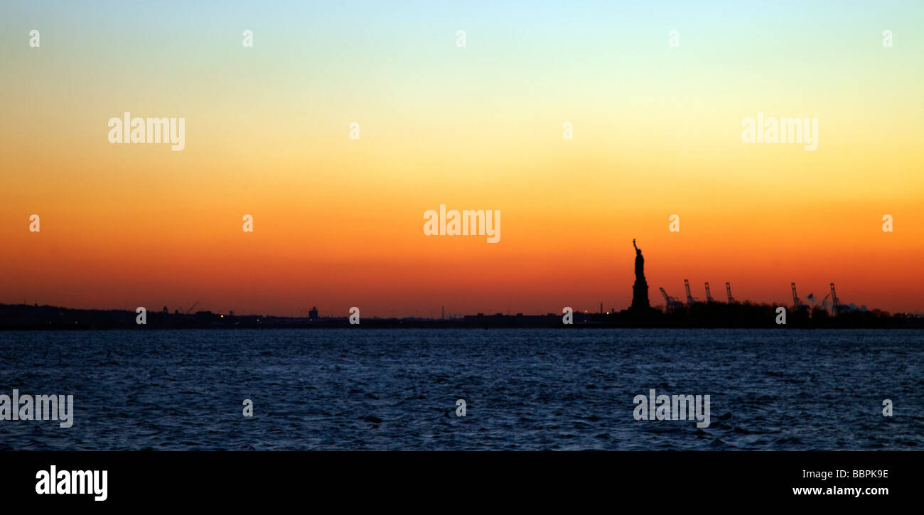 Statue liberty sunset view from hi-res stock photography and images - Alamy