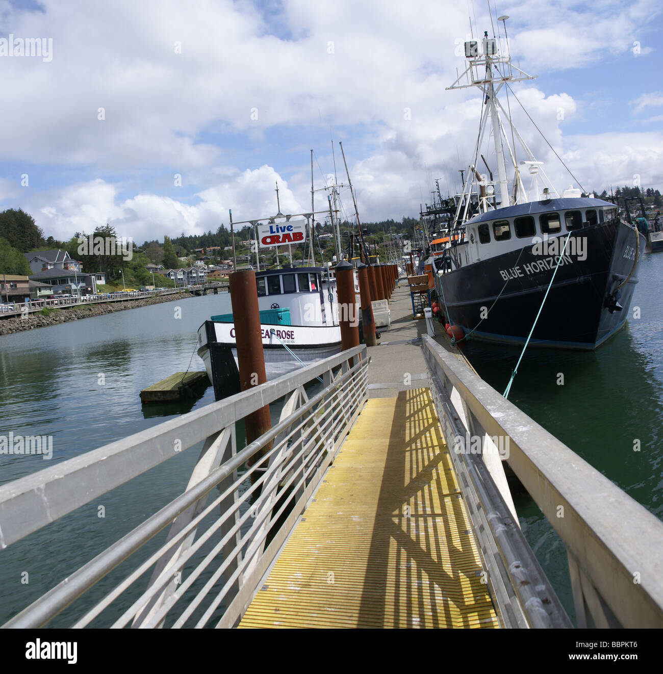 NEWPORT OREGON 8 MAY 2009 Walking down ramp to harbor pier Newport ...