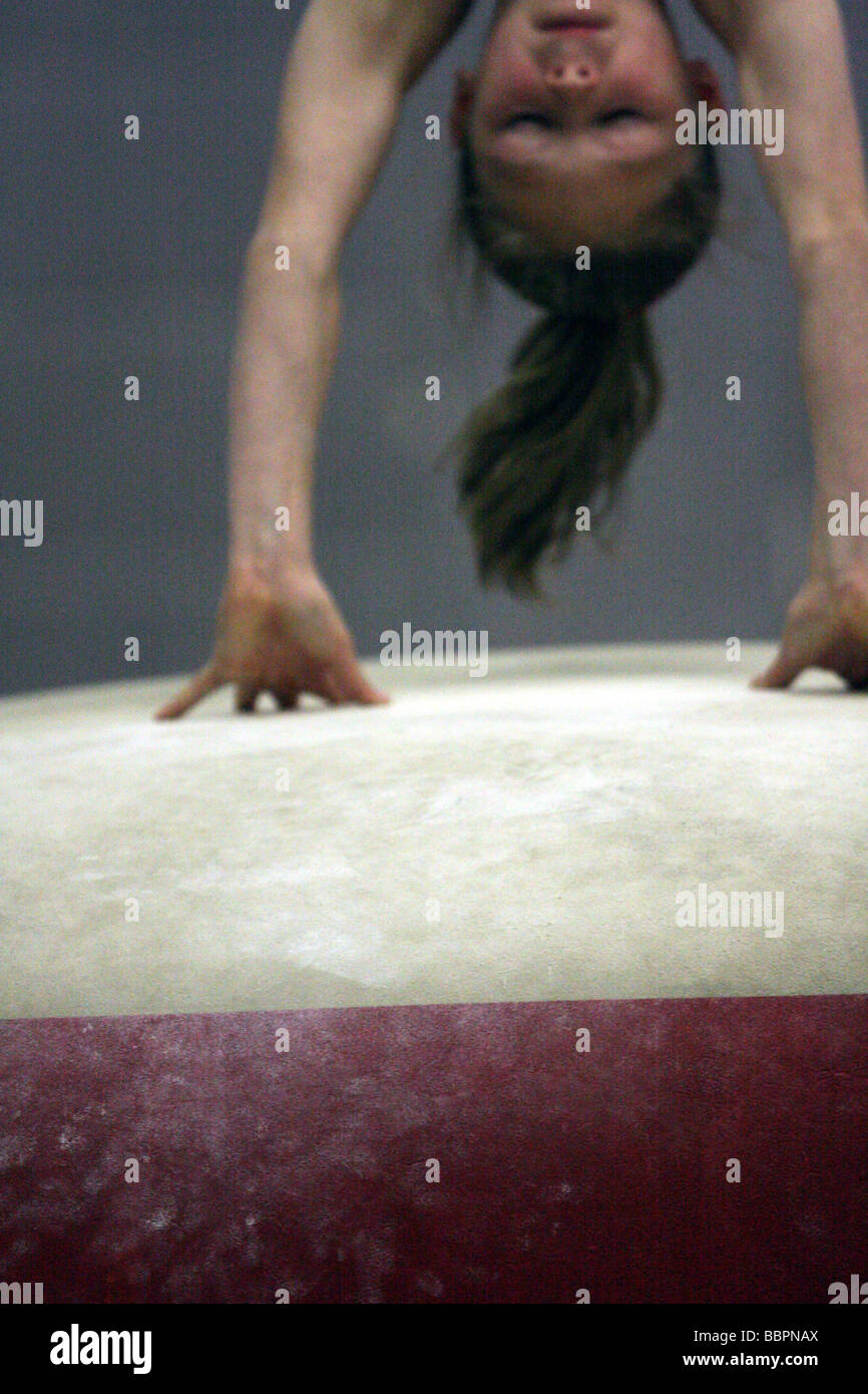 gymnast performs vault in a gymnastics competition Stock Photo - Alamy