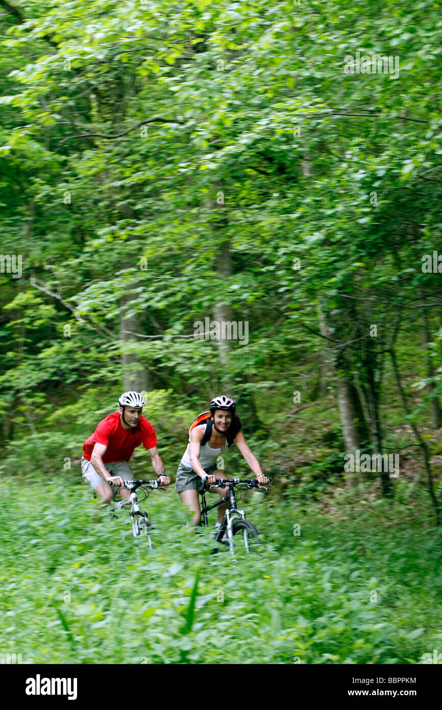 Open air activities mountain bike ride in the forest hi-res stock ...