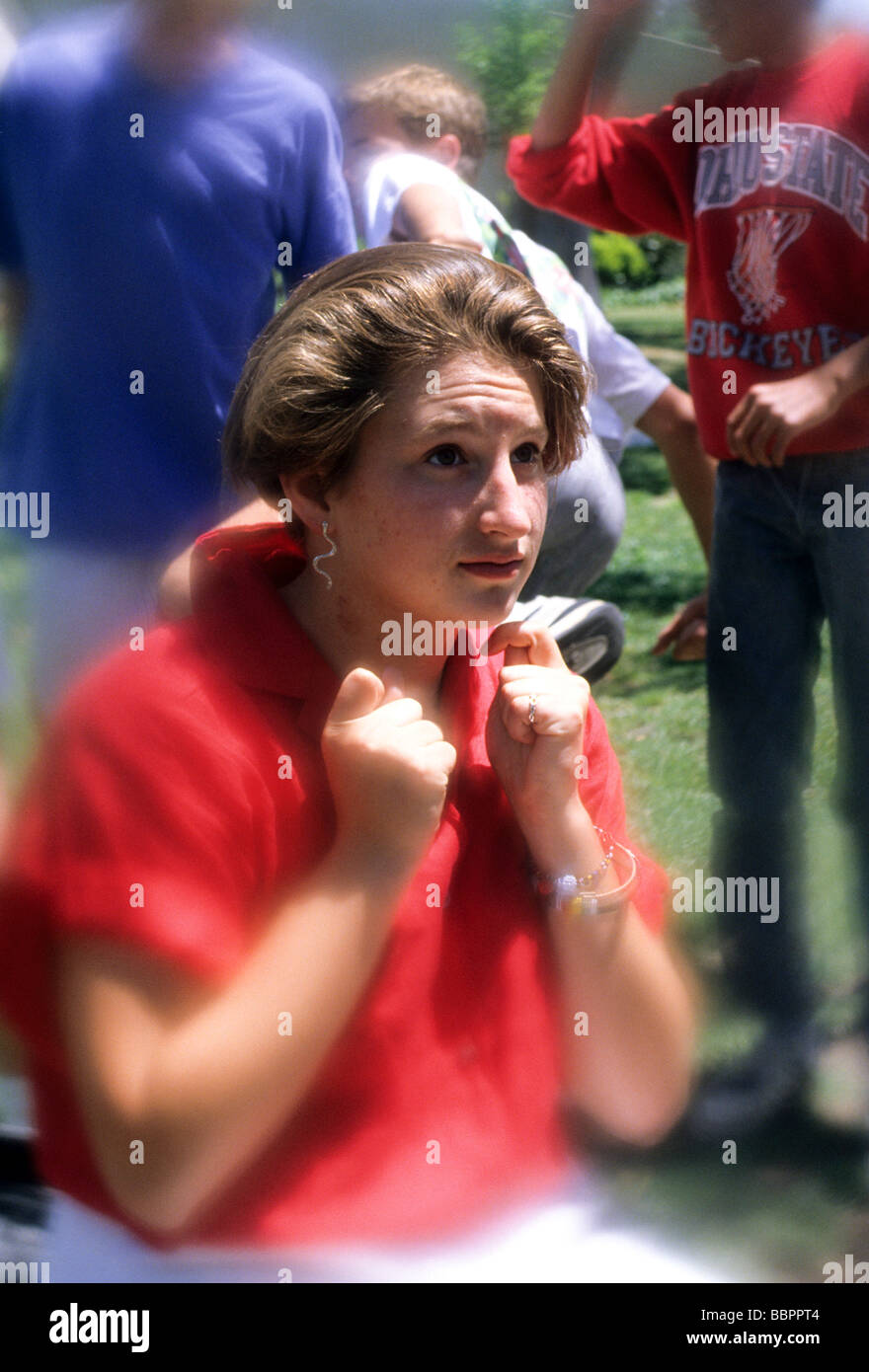 teen girl paranoid afraid alone scared group surround feat psycho Stock ...