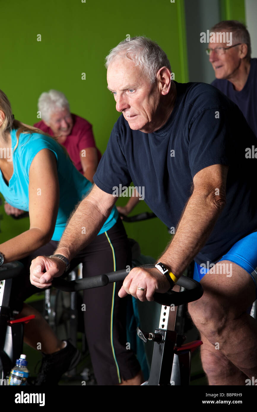 Senior man concentrating hard while in spinning class Stock Photo - Alamy