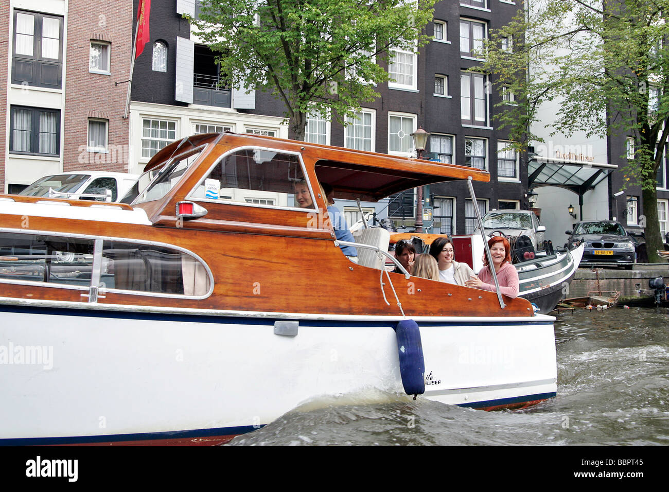 BOAT RIDE ON THE CANALS, AMSTERDAM, NETHERLANDS Stock Photo - Alamy