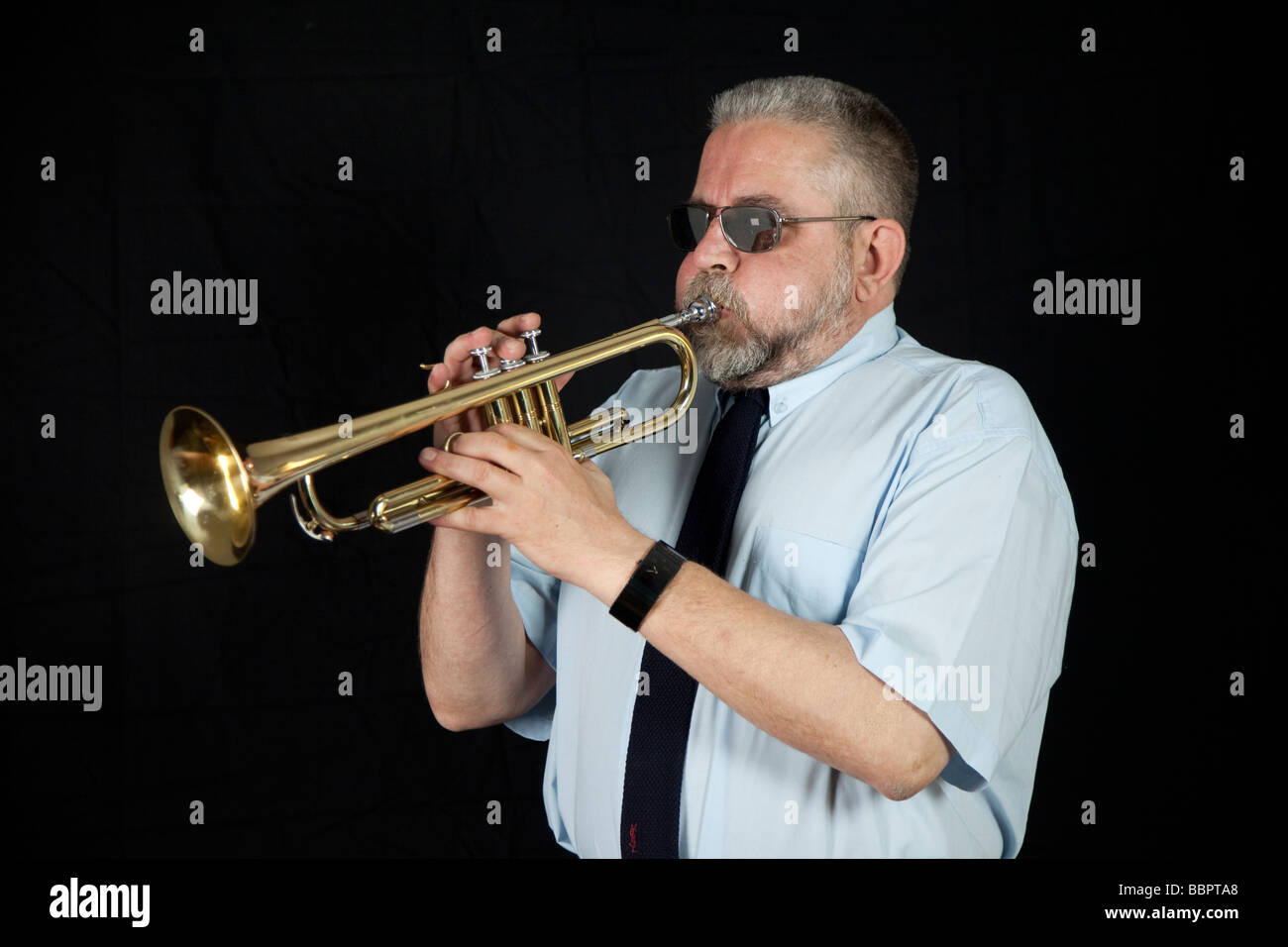 Man playing trumpet music Cut Out Stock Images & Pictures - Alamy