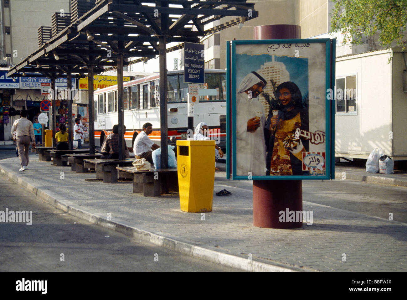 Dubai UAE People Waiting At Bus Station Stock Photo - Alamy