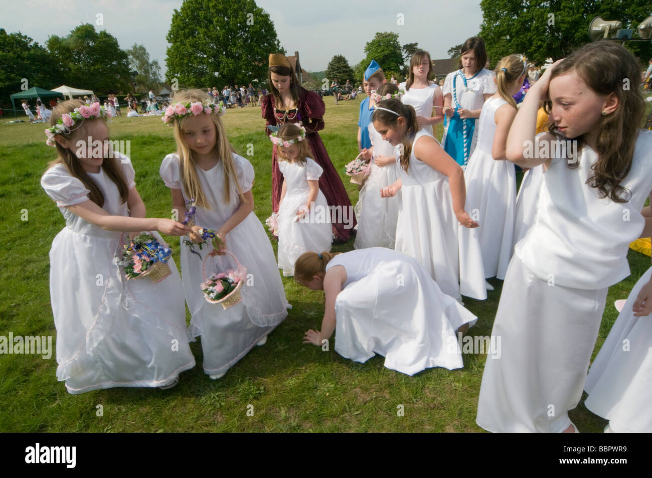 Young girrls from London May Queen scatter flowers, Merrie England and ...