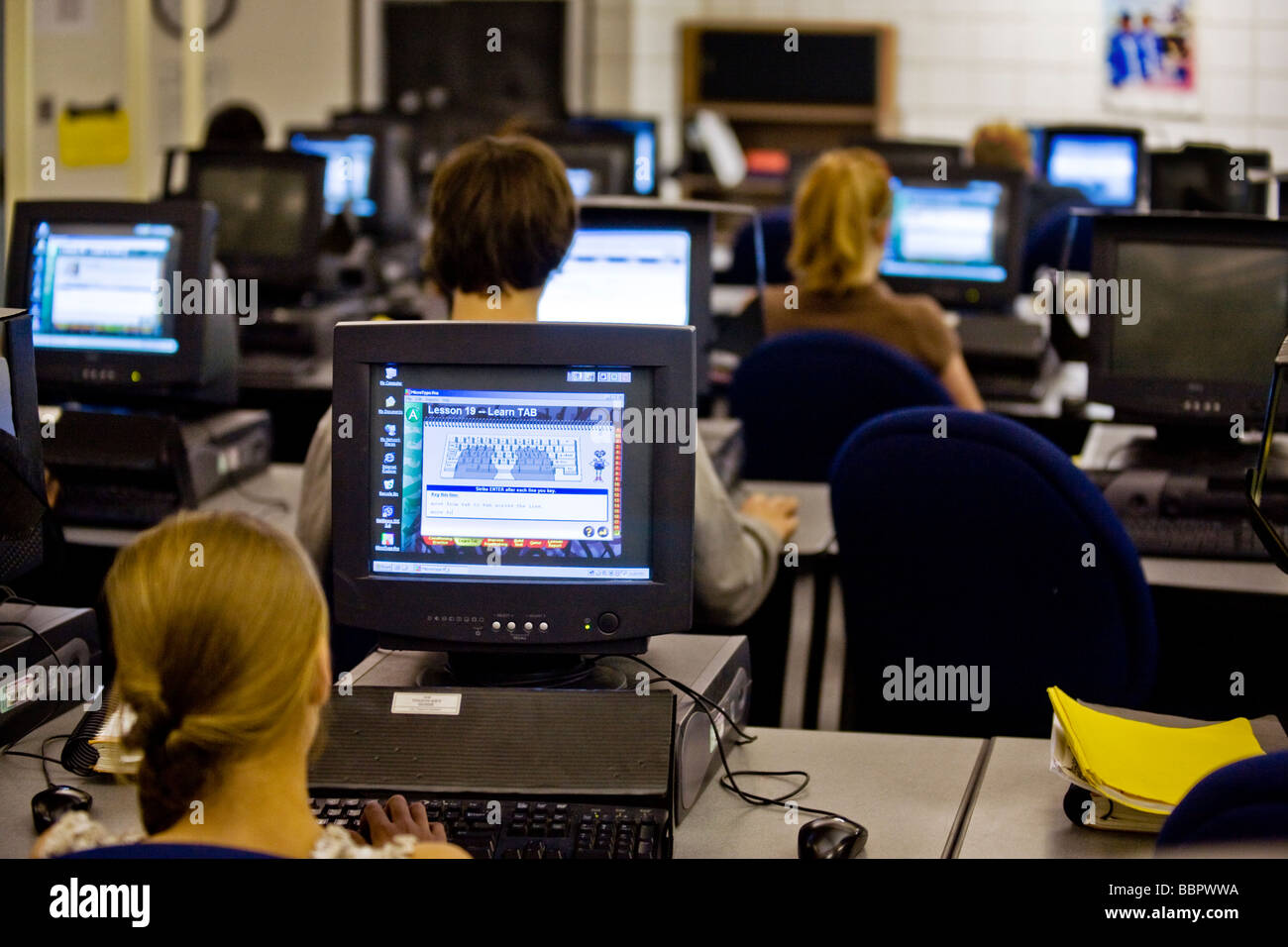 Using a Touch Key Guide that masks the keyboard high school students in ...
