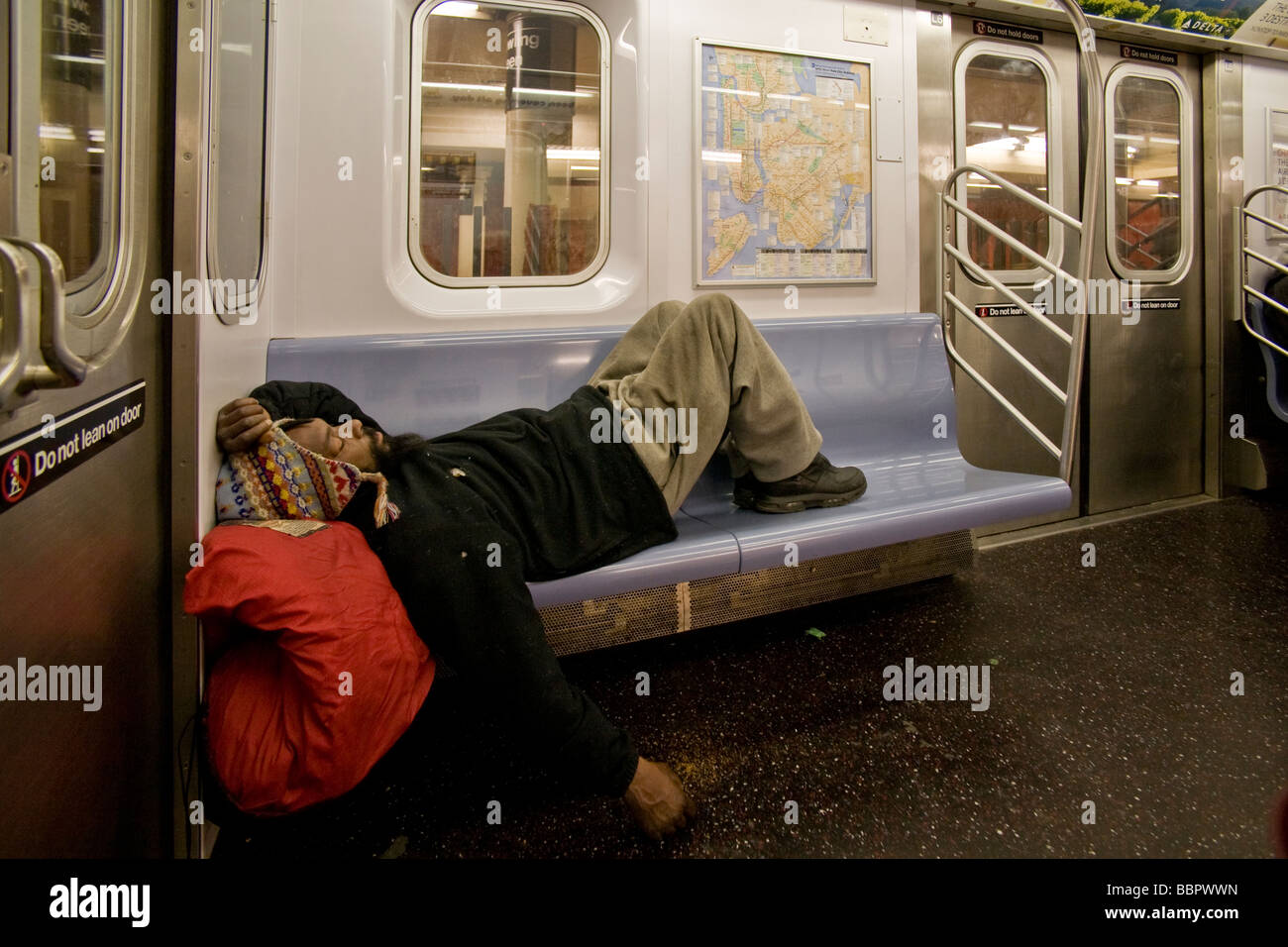 Homeless Man Sleeping In Subway High Resolution Stock Photography and ...