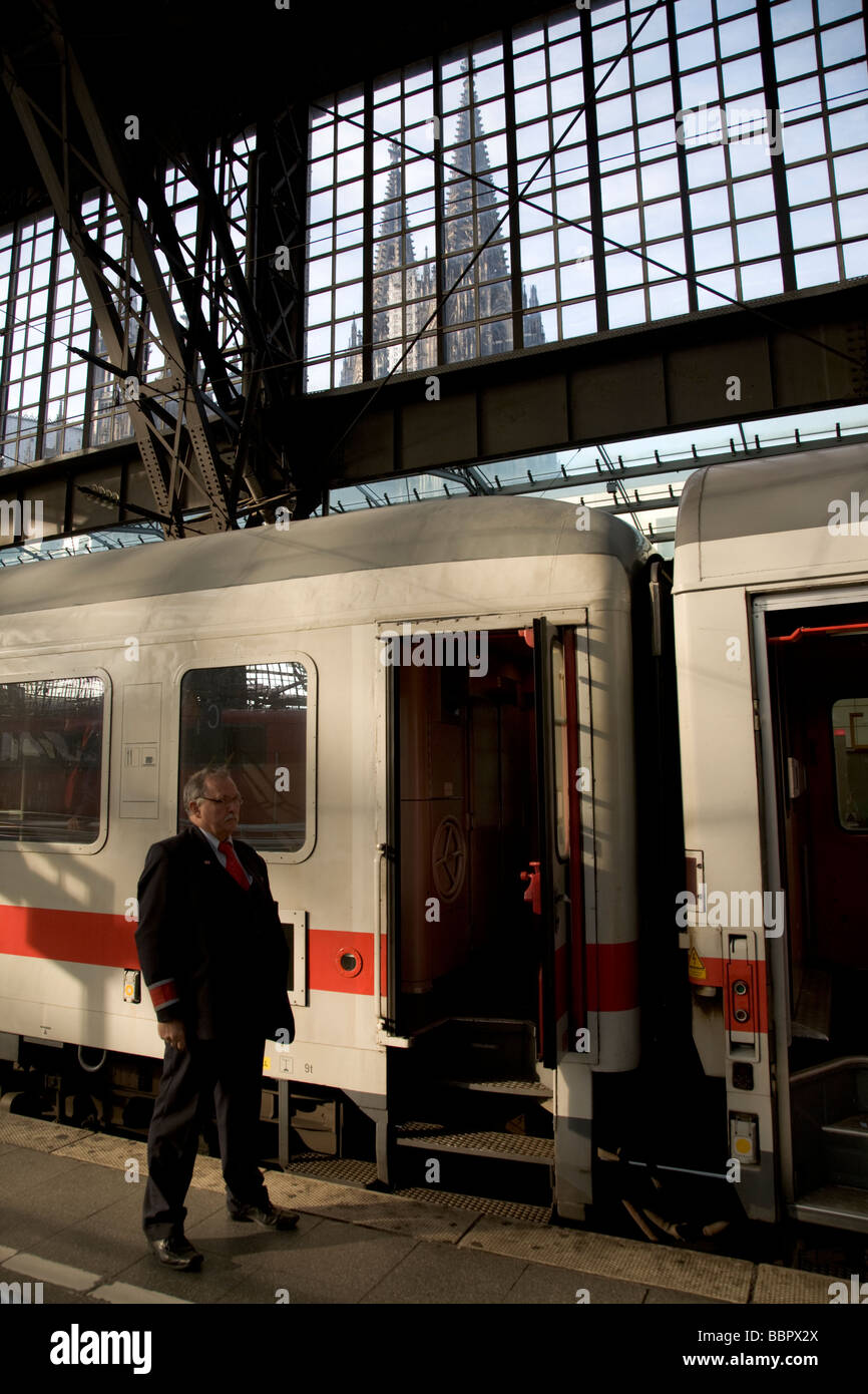Train Conductor Standing In Front of Train Carriage At Platform Cologne ...