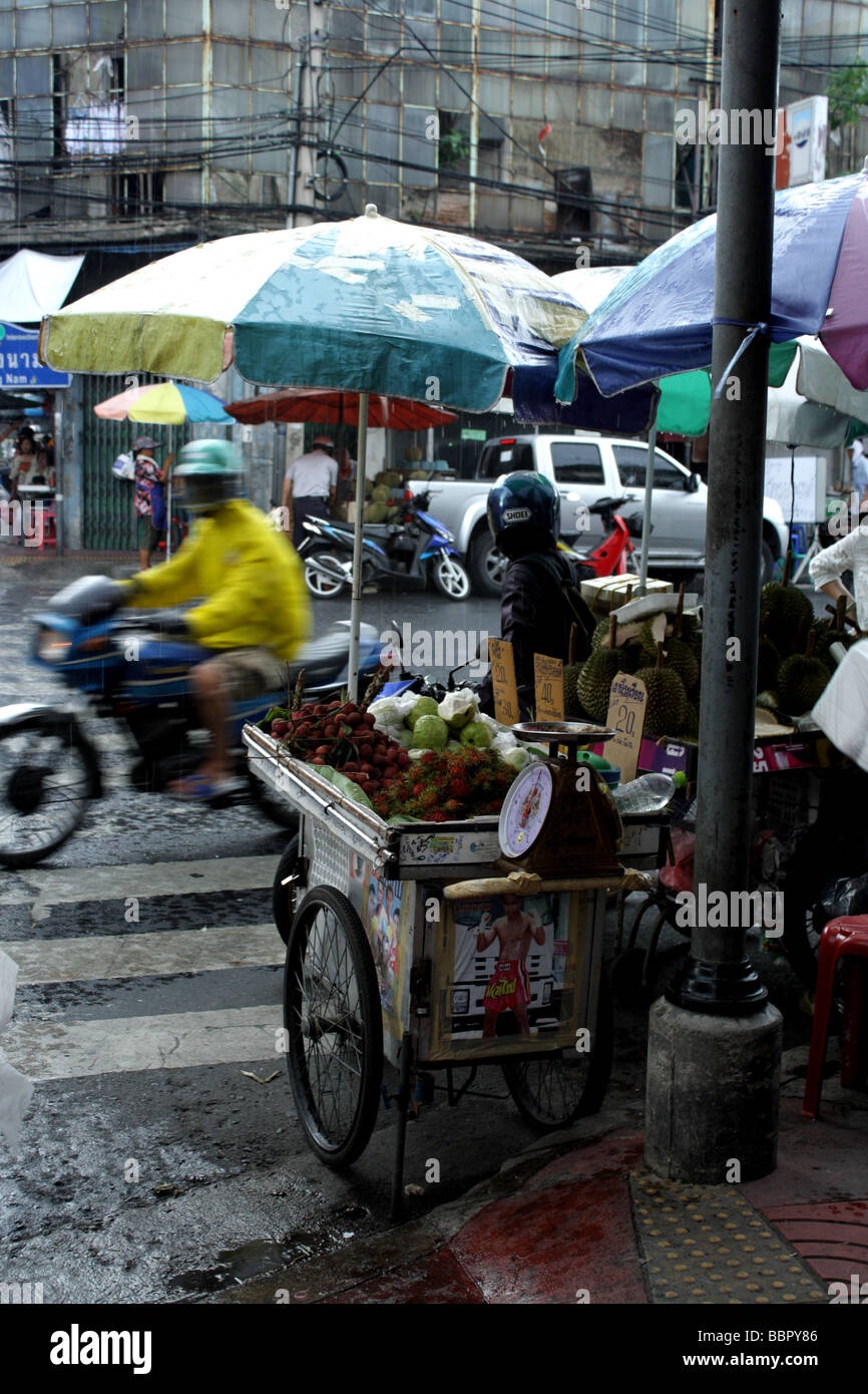 Bangkok moped rain hi-res stock photography and images - Alamy