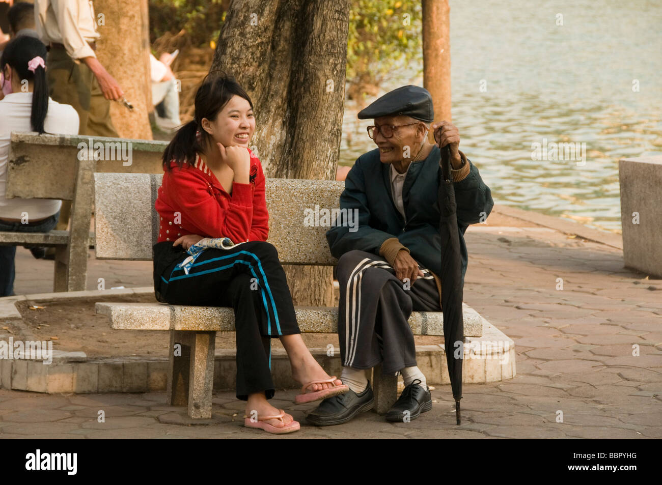 chatting in the park in Hanoi Vietnam Stock Photo - Alamy