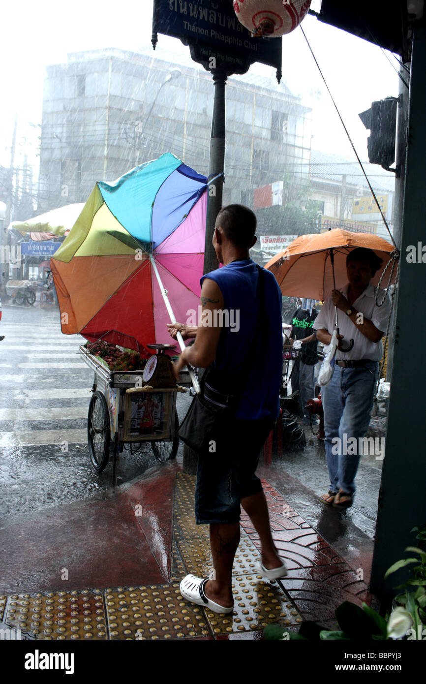 Bangkok moped rain hi-res stock photography and images - Alamy