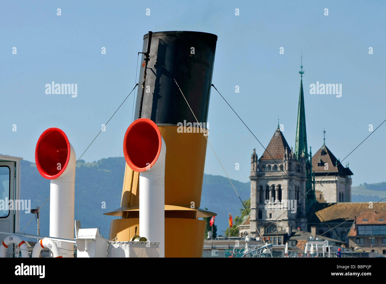 SMOKE STACKS ON A CRUISE BOAT ON LAKE GENEVA IN FRONT OF SAINT PETER'S ...