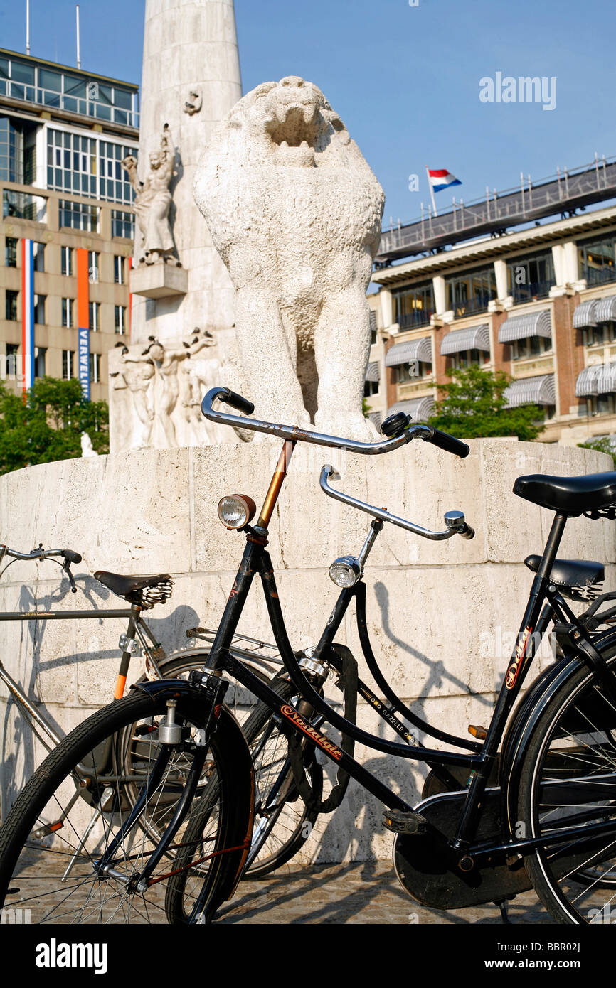 BIKES AND STATUE OF THE LION, NATIONAL MONUMENT, DAMS SQUARE, AMSTERDAM ...