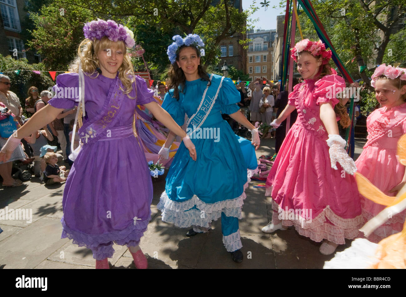Donna Maria's Maypole dancers in brightly colored dresses at Covent ...