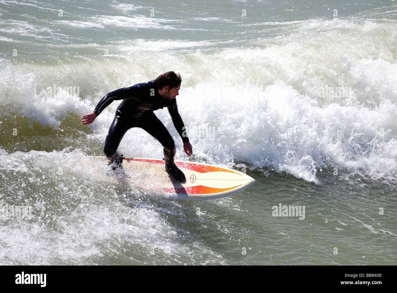 Man with surf hi-res stock photography and images - Alamy