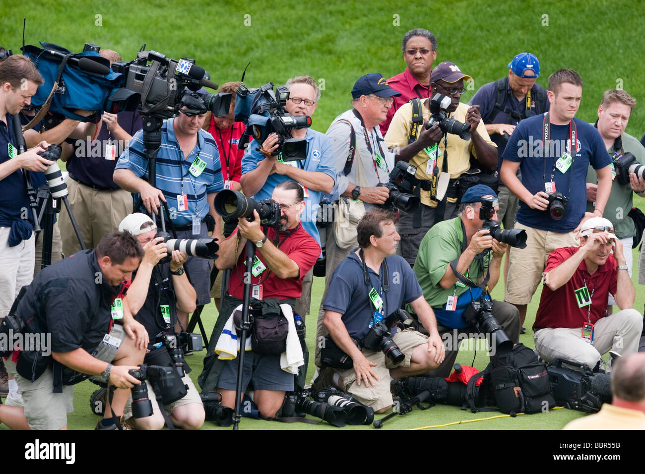 Sports photographers at a professional golf tournament in Cromwell CT ...