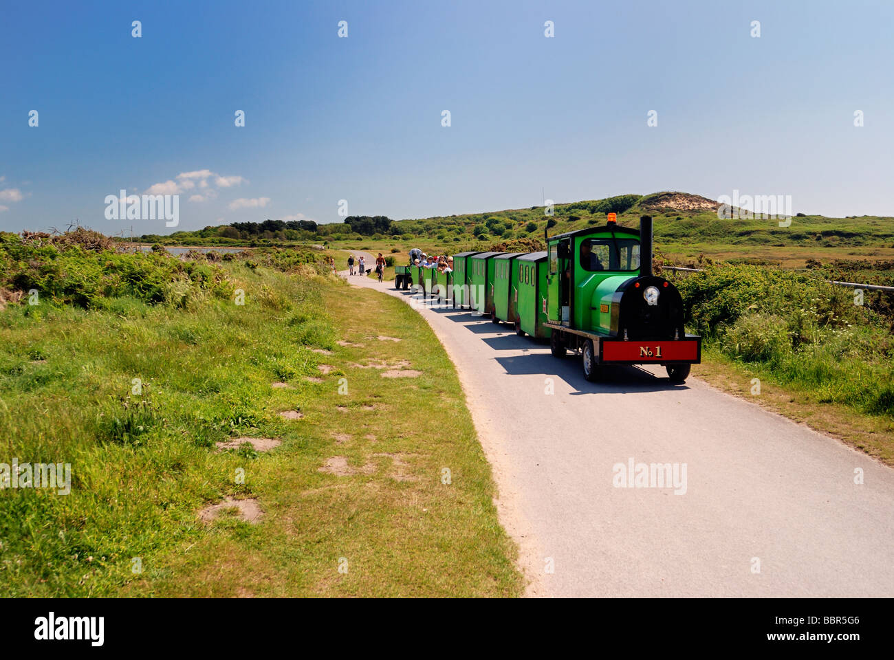 The Noddy land train taking passengers along Hengistbury Head Stock ...