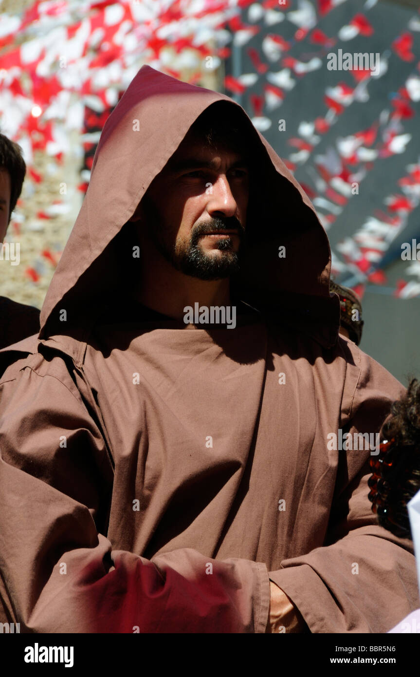 Stock photo of a man dressed up as a bearded monk in a parade Stock ...