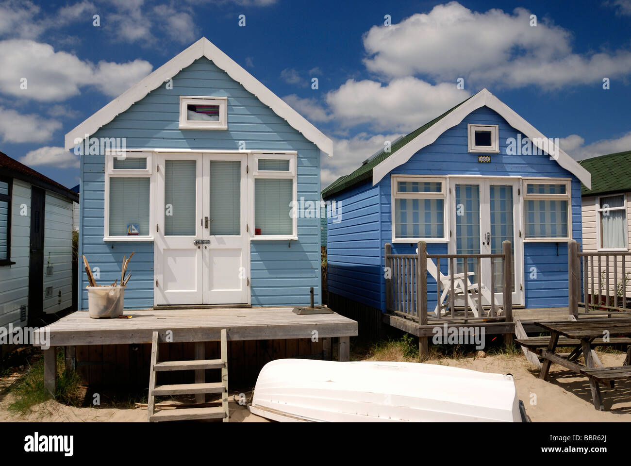 Two large deluxe beach huts Stock Photo - Alamy