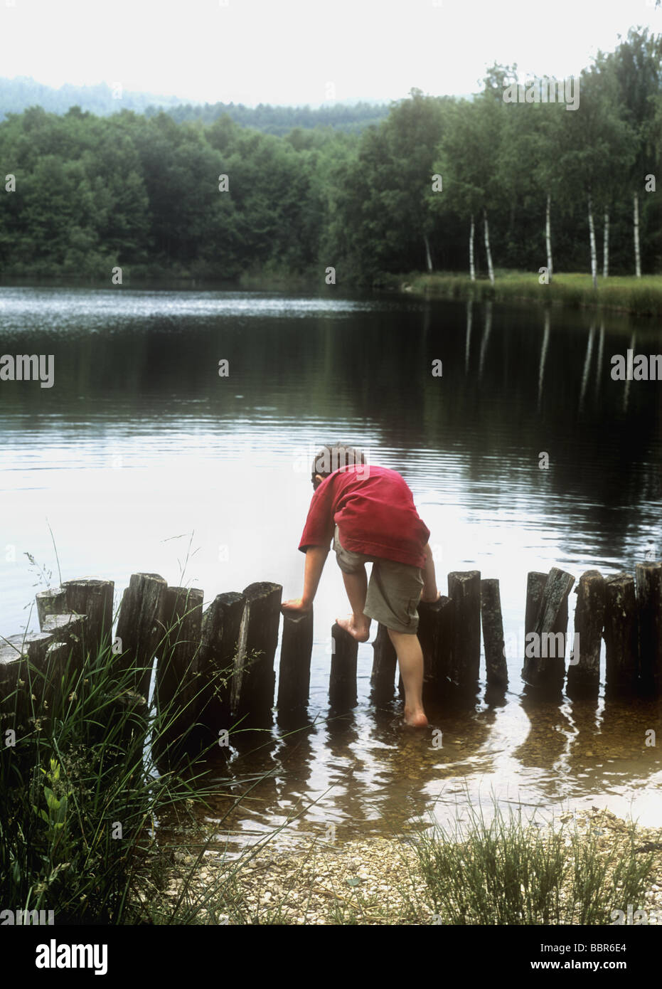 Kids playing beside lake hi-res stock photography and images - Alamy