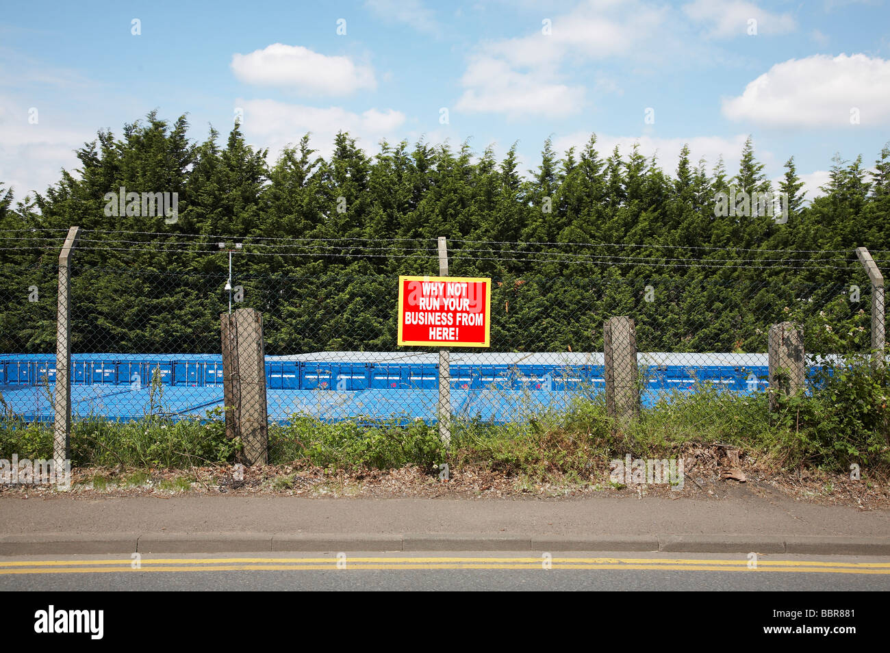 Advertising sign selling storage space in containers Stock Photo - Alamy