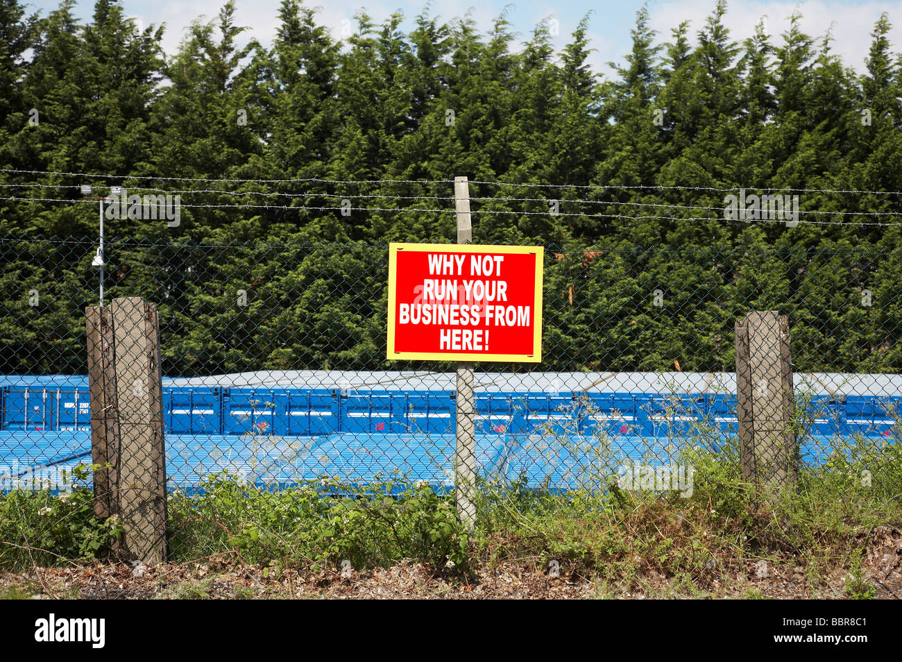 Advertising sign selling storage space in containers Stock Photo - Alamy
