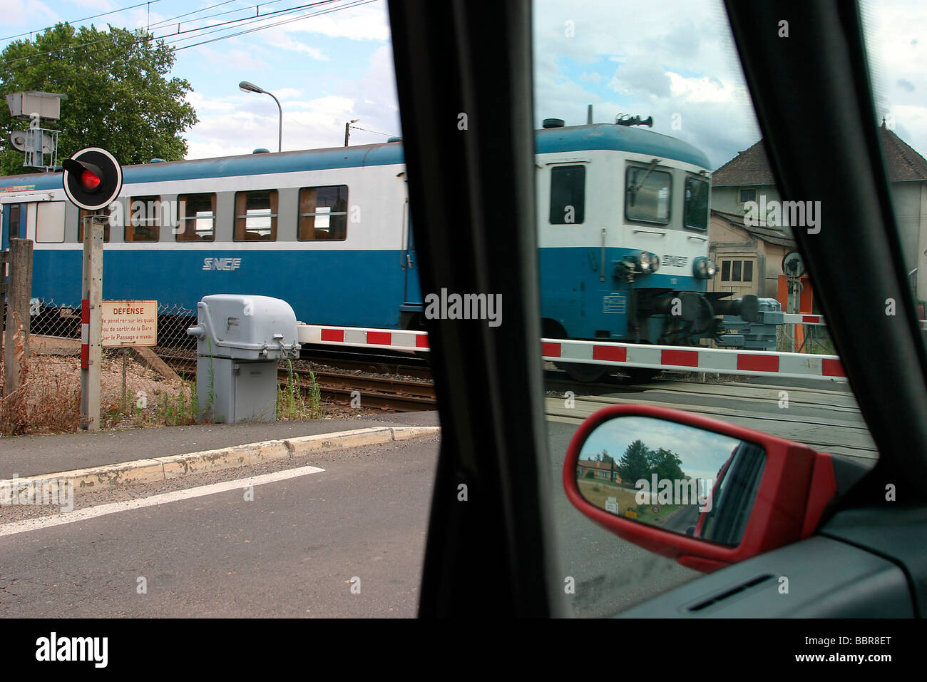 TRAIN PASSING A LEVEL CROSSING, BARRIERS DOWN, EURE-ET-LOIR (28 ...