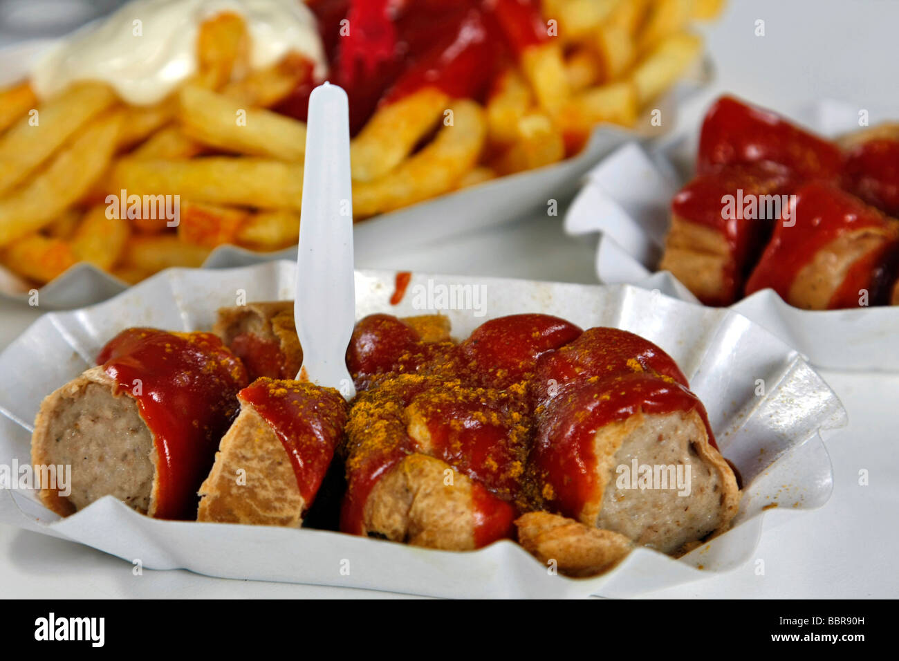 SEASONED CURRYWURST (SAUSAGE IN CURRY, A TRADITIONAL DISH) IN TOMATO ...