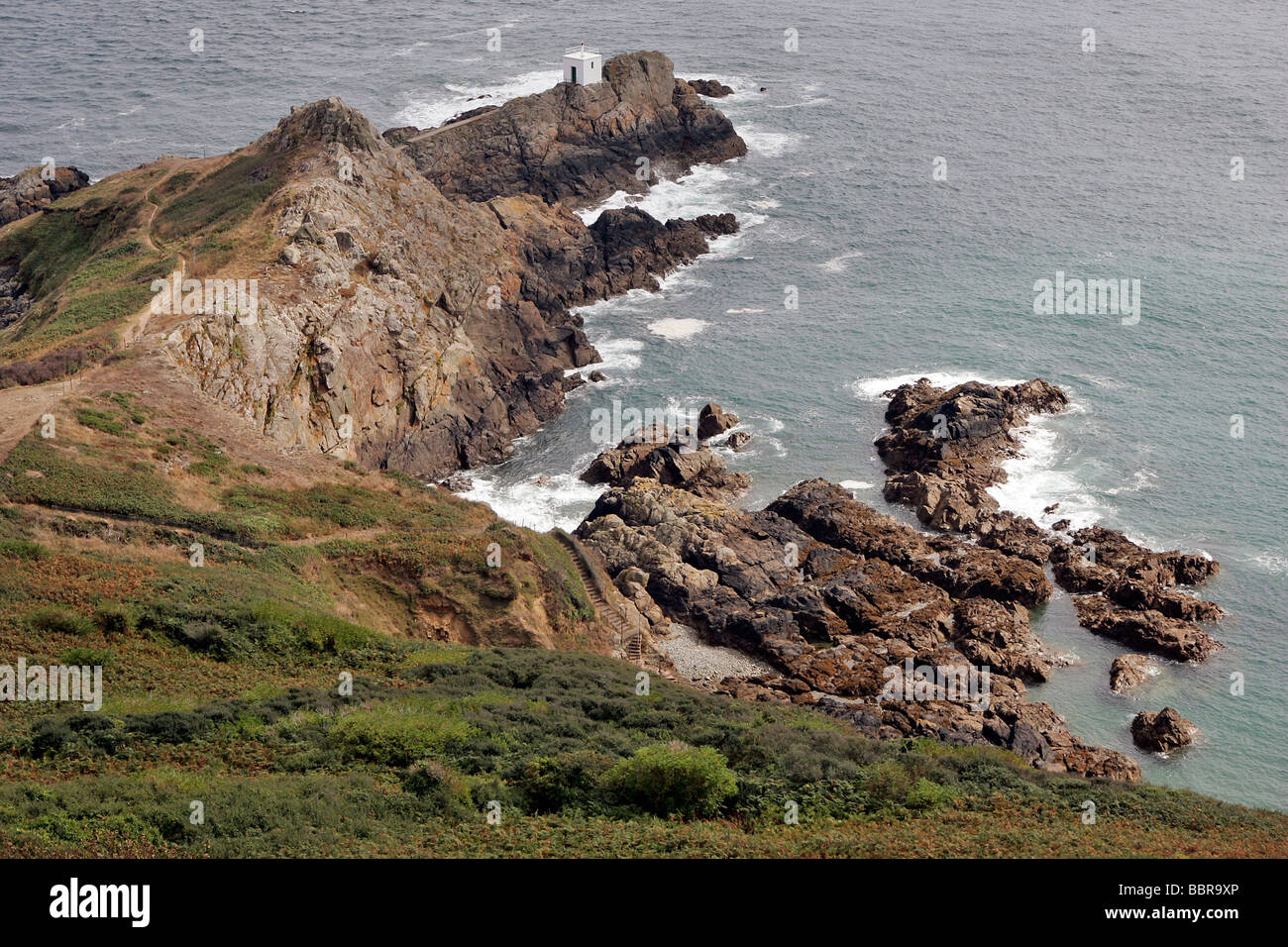 CLIFFS OF JERBOURG POINT, SAINT-MARTIN, GUERNSEY, ENGLAND Stock Photo ...