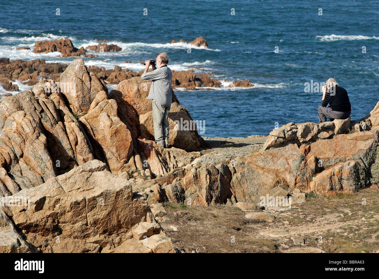 BEACH AND CLIFFS OF COCO BAY, GUERNSEY, ENGLAND Stock Photo - Alamy