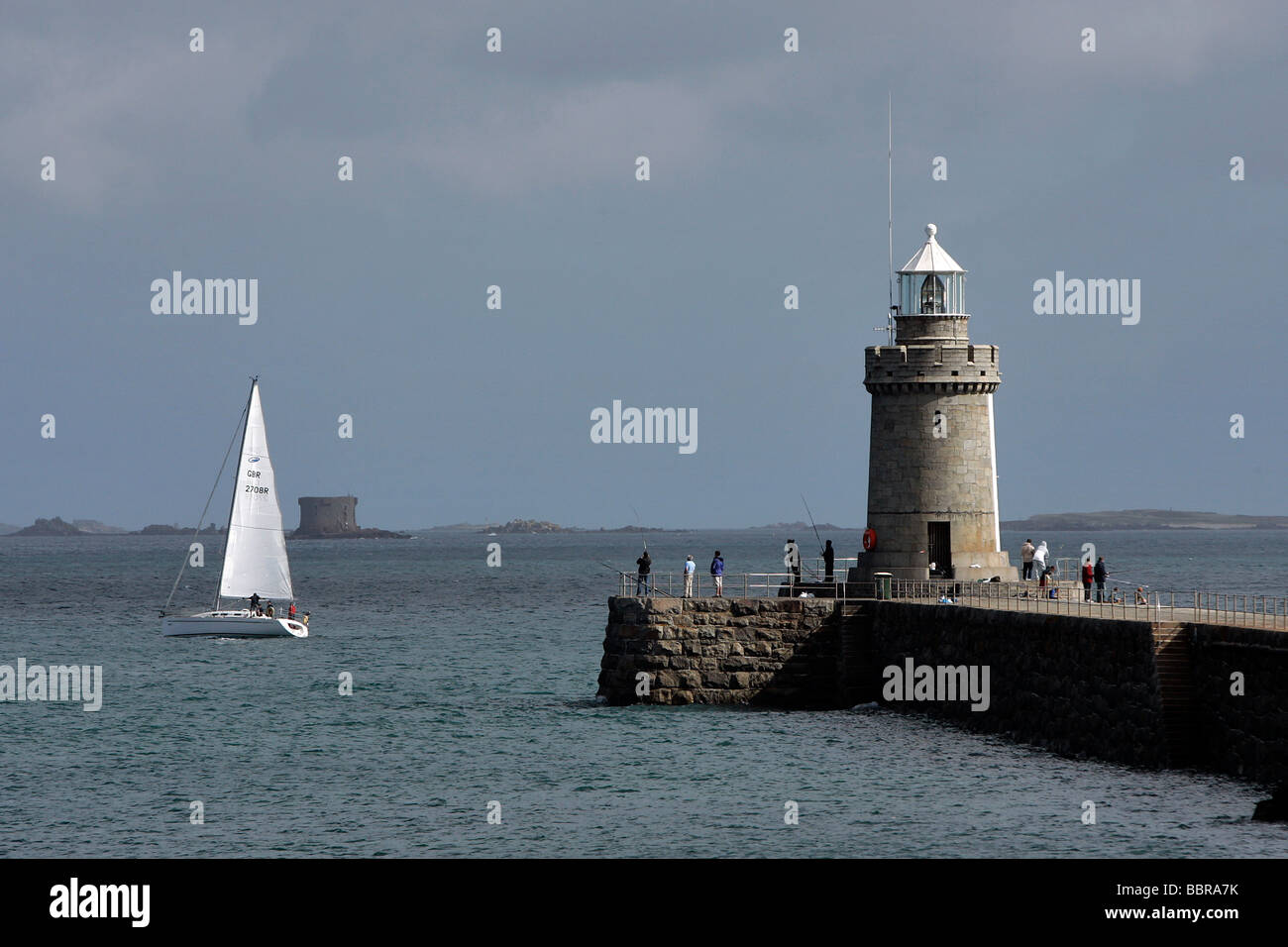 JETTY ON THE PORT OF SAINT PETER PORT, GUERNSEY, ENGLAND Stock Photo ...