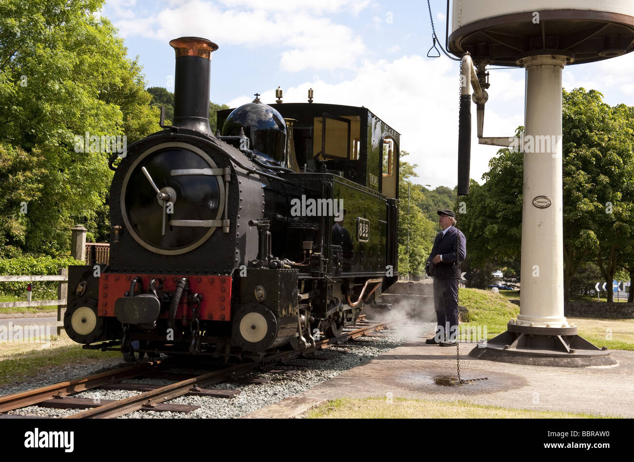 Steam Engine "Earl" filling up with water at station platform water ...