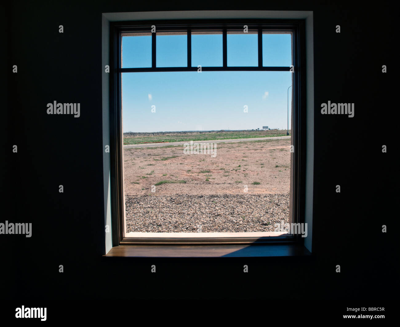 Desert seen through window Stock Photo - Alamy