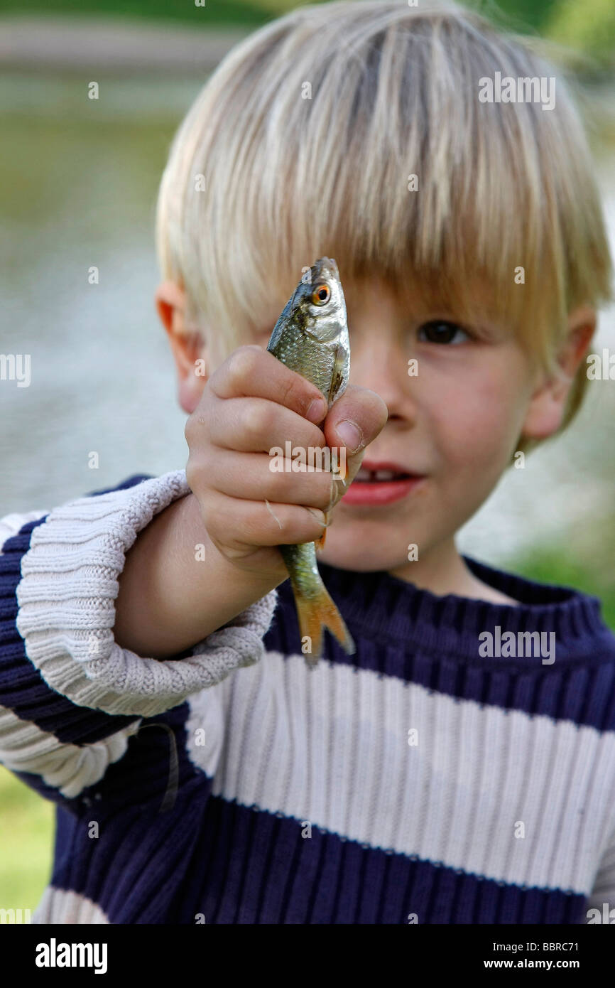 THE LOOK OF A YOUNG CHILD AFTER HIS FIRST CATCH, FISHING WITH THE ...