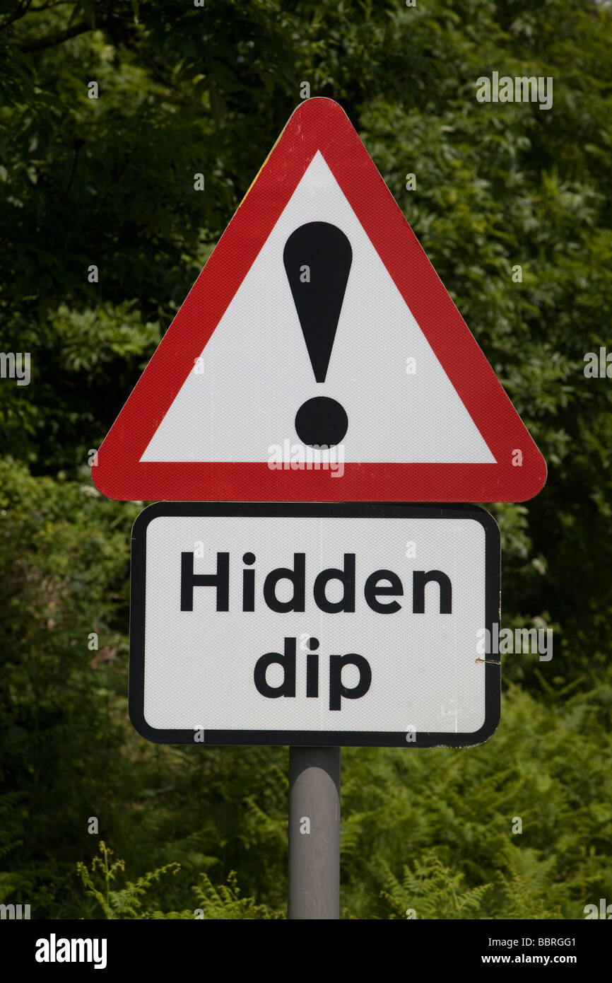 Road sign with red triangle exclamation mark for Hidden Dip Stock Photo ...