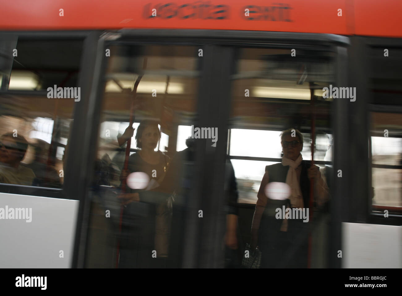 people on fast public transport bus in rome italy Stock Photo - Alamy