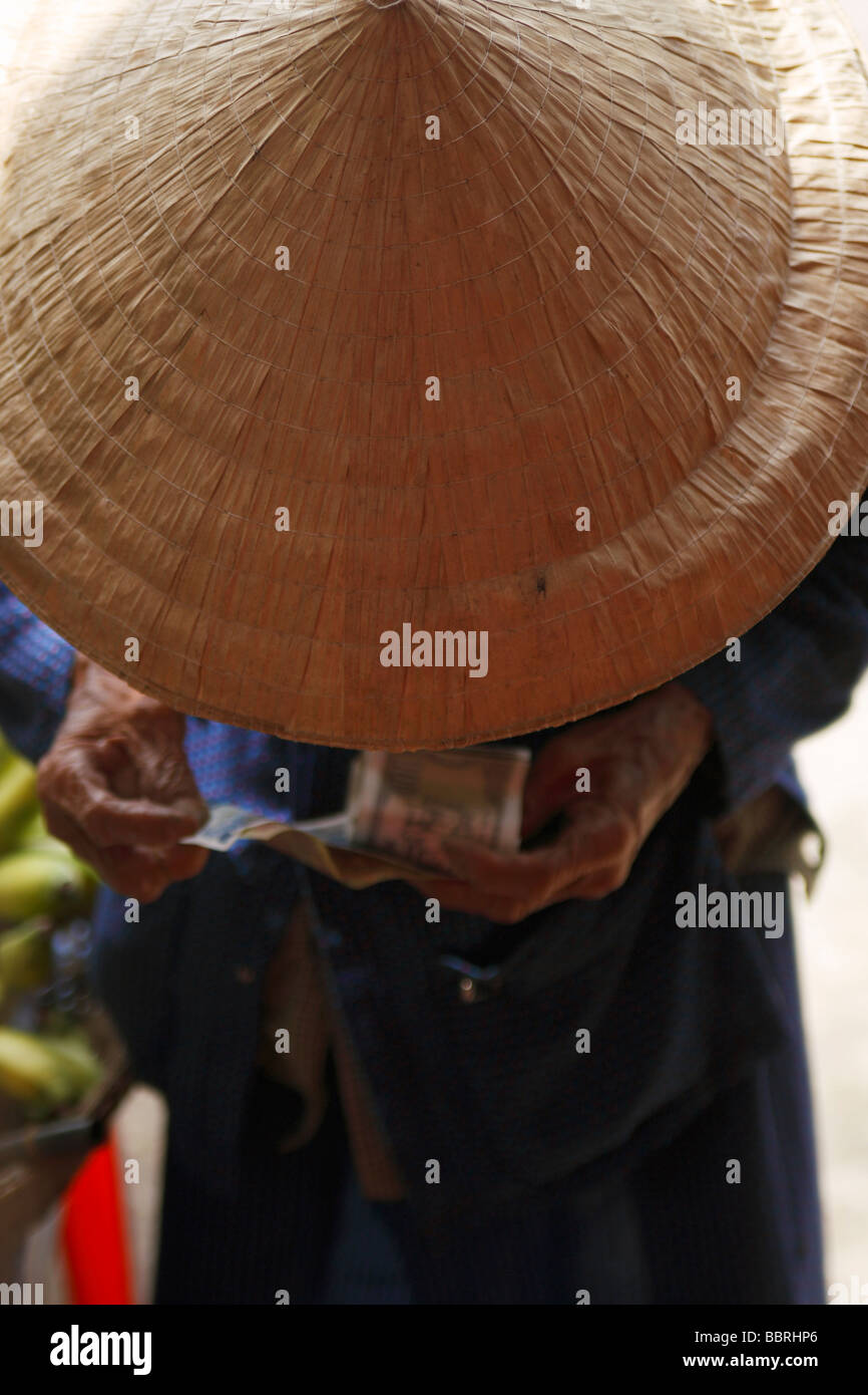 Wearing conical hat hi-res stock photography and images - Alamy