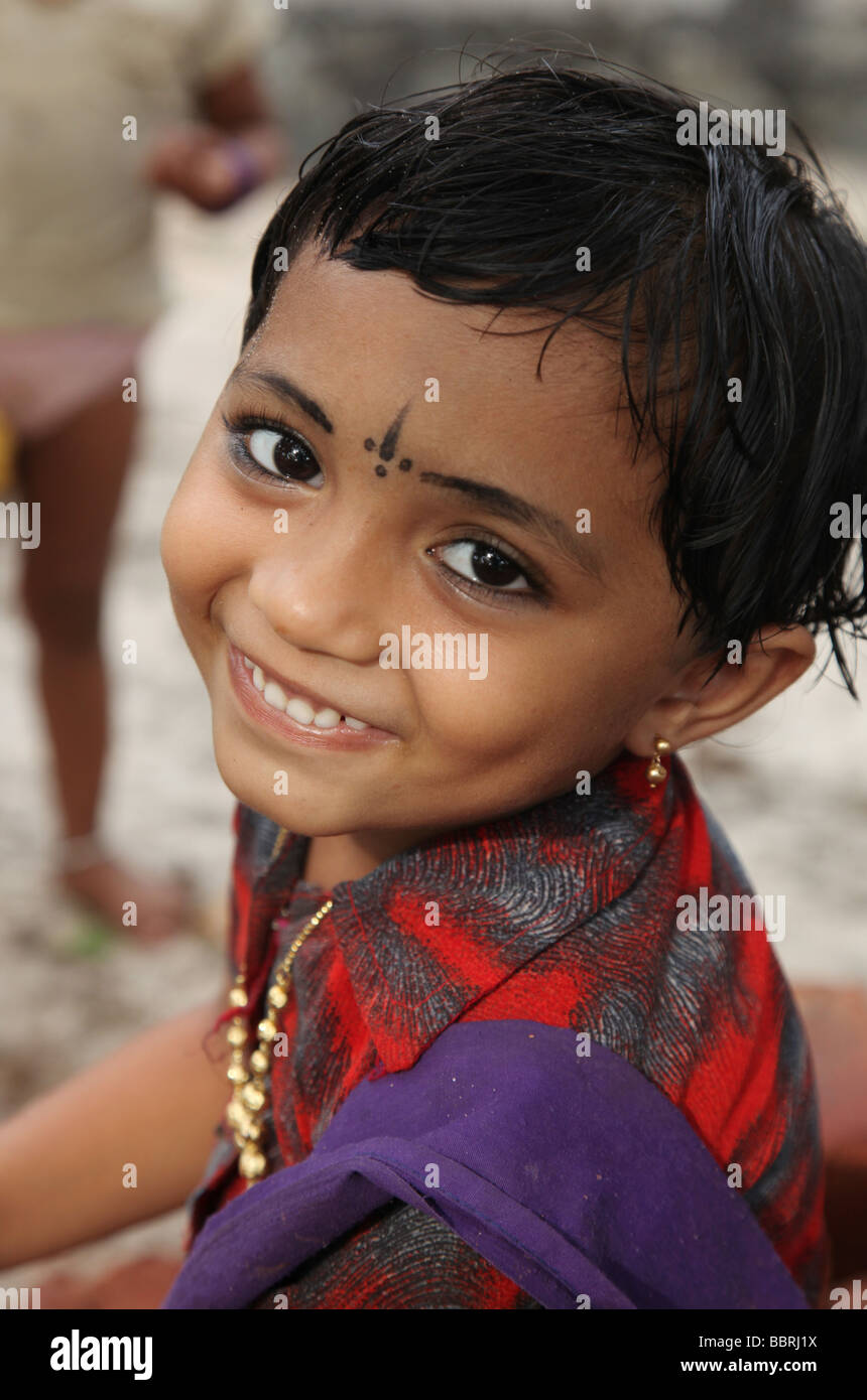 Local Child wearing a bindi smiling in a Coir Village in Alleppey ...