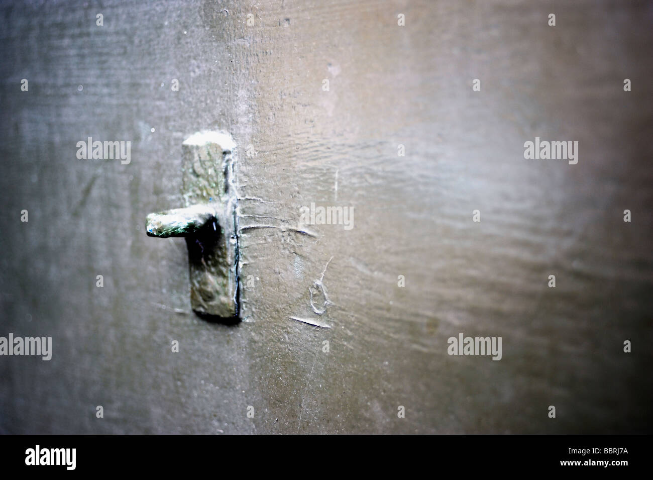 Metal fixing on a wooden door Stock Photo - Alamy